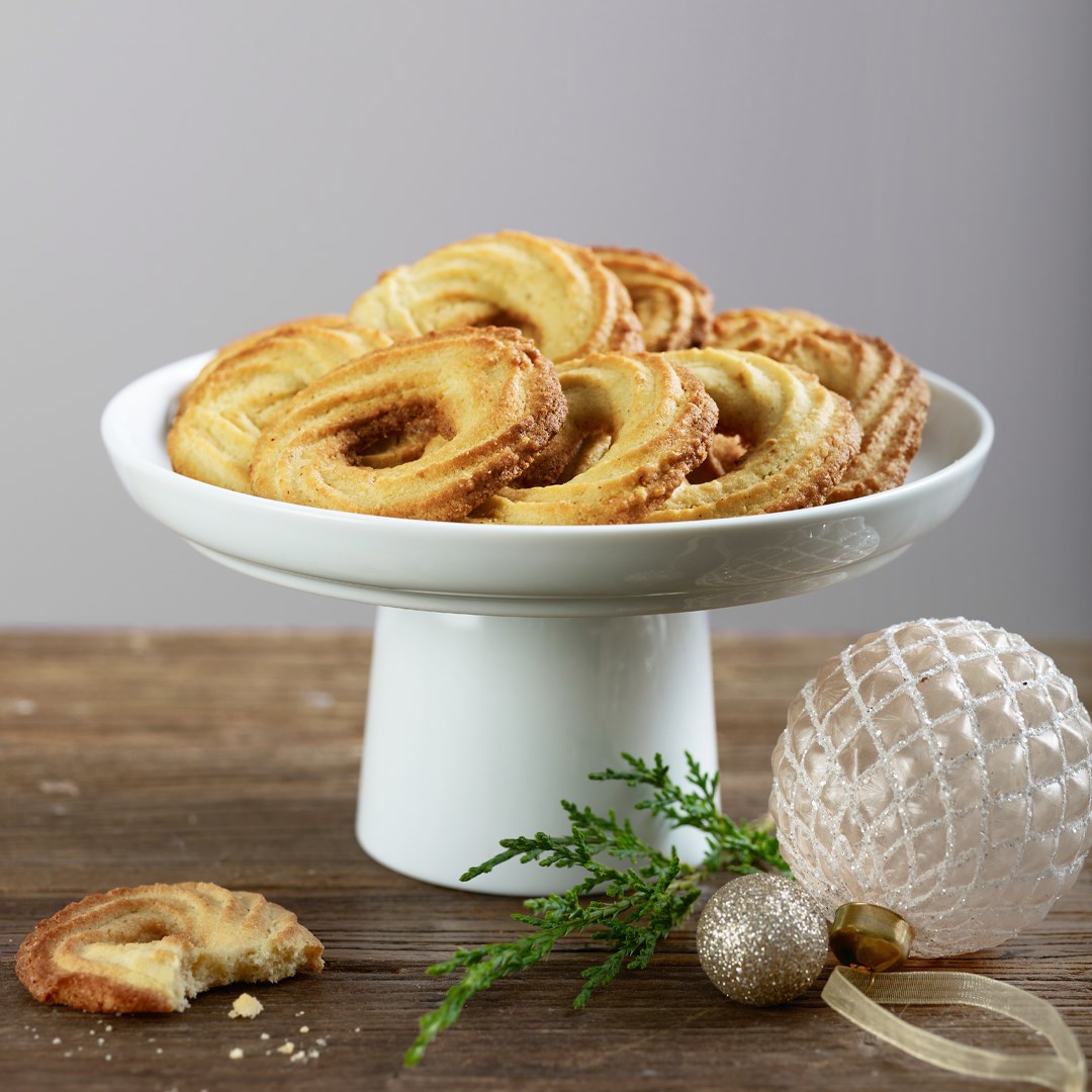 Få opskriften på Vaniljekranse med appelsin og kardemomme